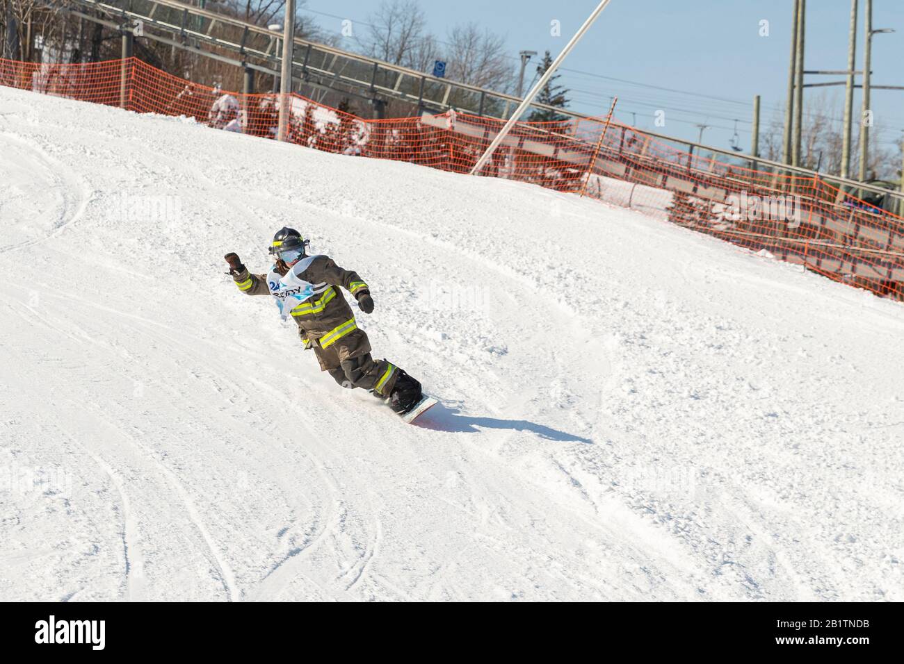 Downhill skiing and snowboarding Stock Photo - Alamy