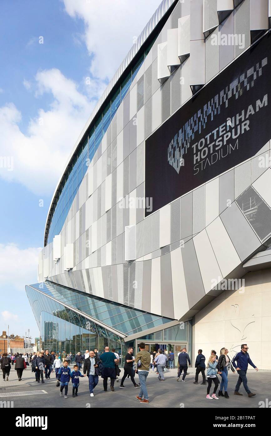 Detail of steel clad facade and fans arriving. The New Tottenham ...