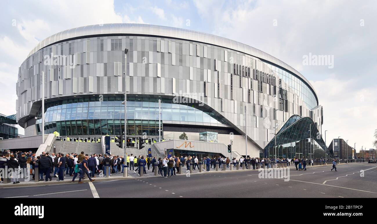 View across street with main entrance and crowd arrivinhg. The New ...