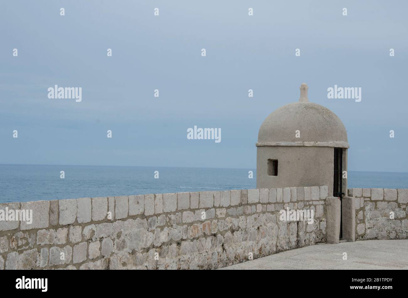 View of the gun turret on Dubrovnik city walls and sea in Croatia Stock ...
