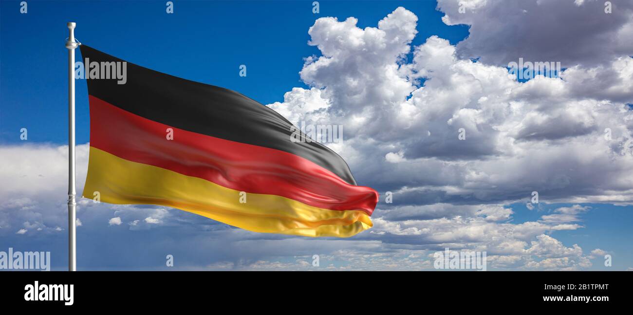 Germany sign, symbol. German national flag waving on a pole, blue sky ...