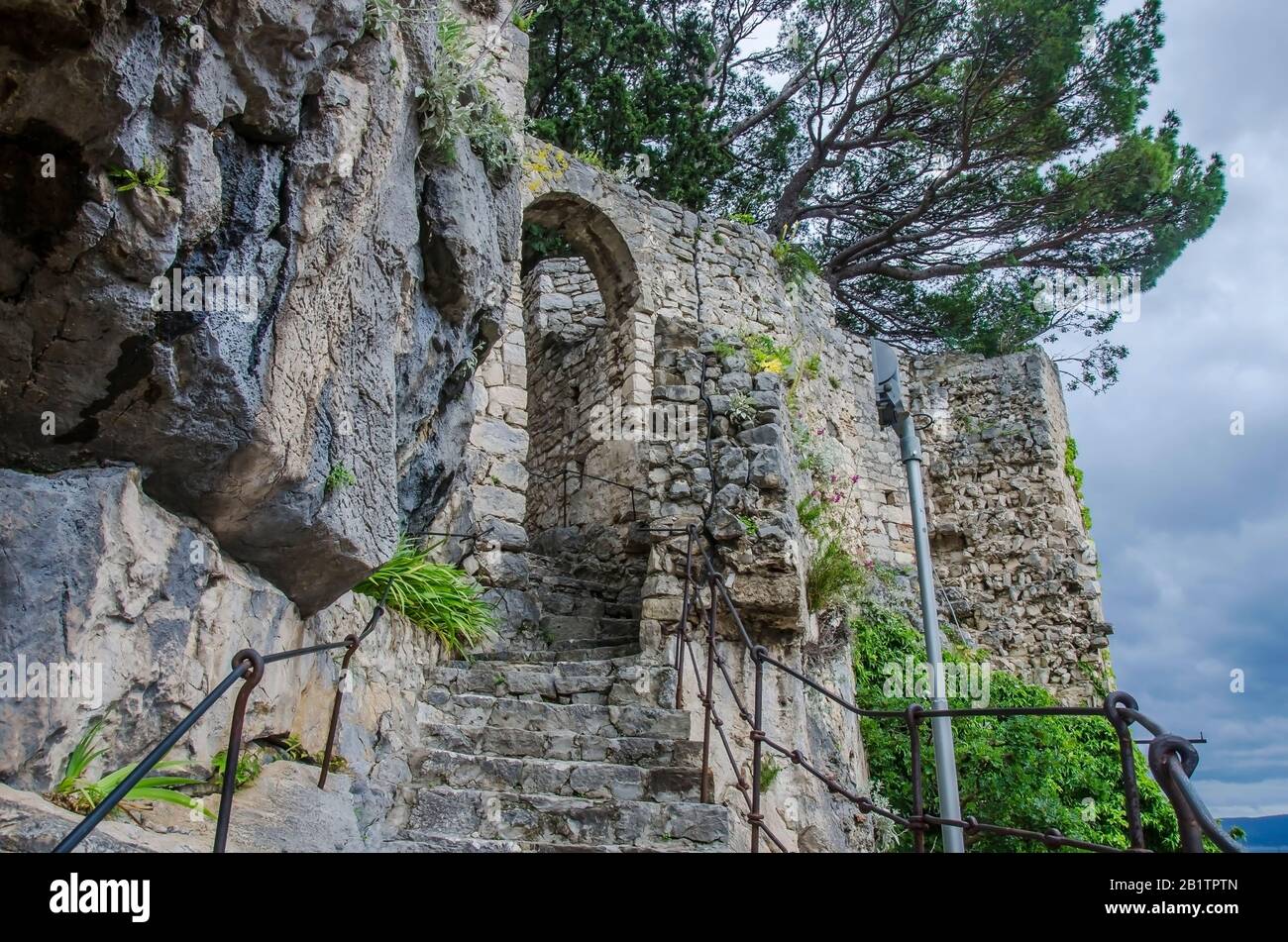 View of stone stairs to Mirabella fortress, Omis, Croatia. Omis, small ...