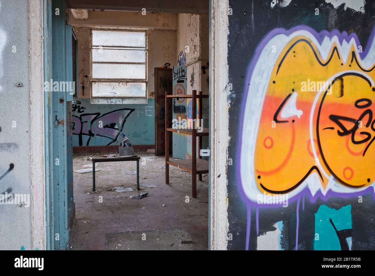 Neglected buildings, isolated, urban art, with spray painted graffiti ...