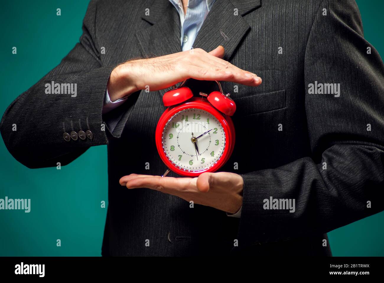 Old bearded man and clock hi-res stock photography and images - Alamy