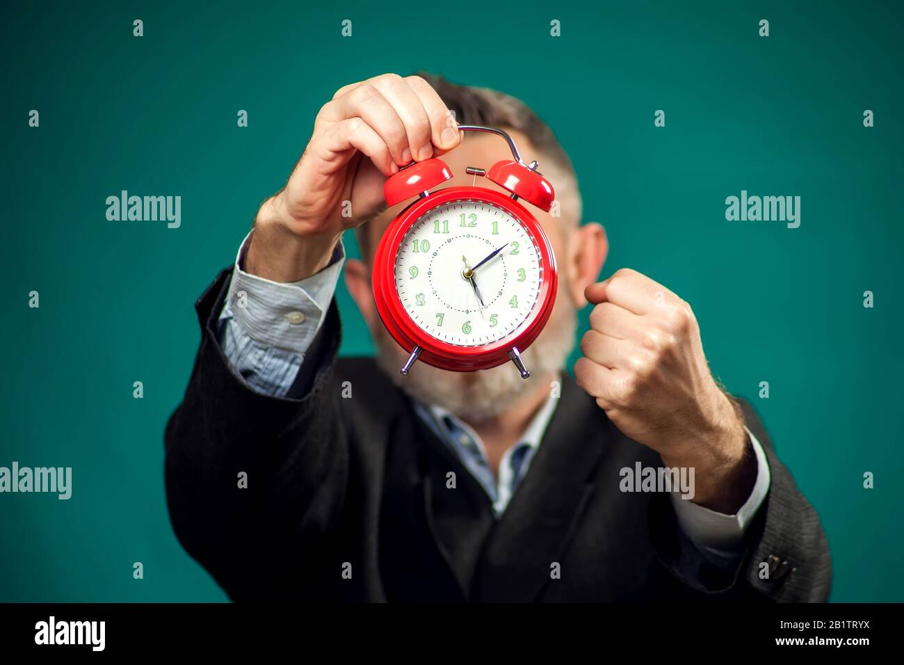 Angry man alarm clock in hi-res stock photography and images - Alamy
