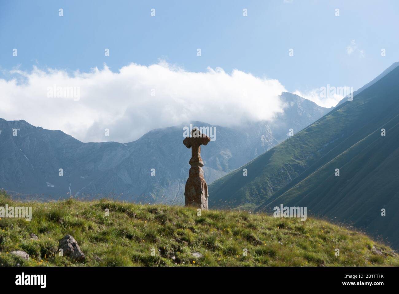 The cross in the mountains hi-res stock photography and images - Alamy