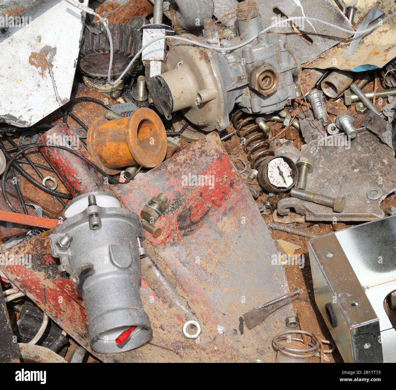 background of old rusty pieces of iron of a landfill to recycle unused ...