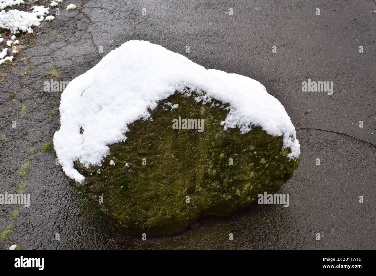 stone with snow Stock Photo - Alamy