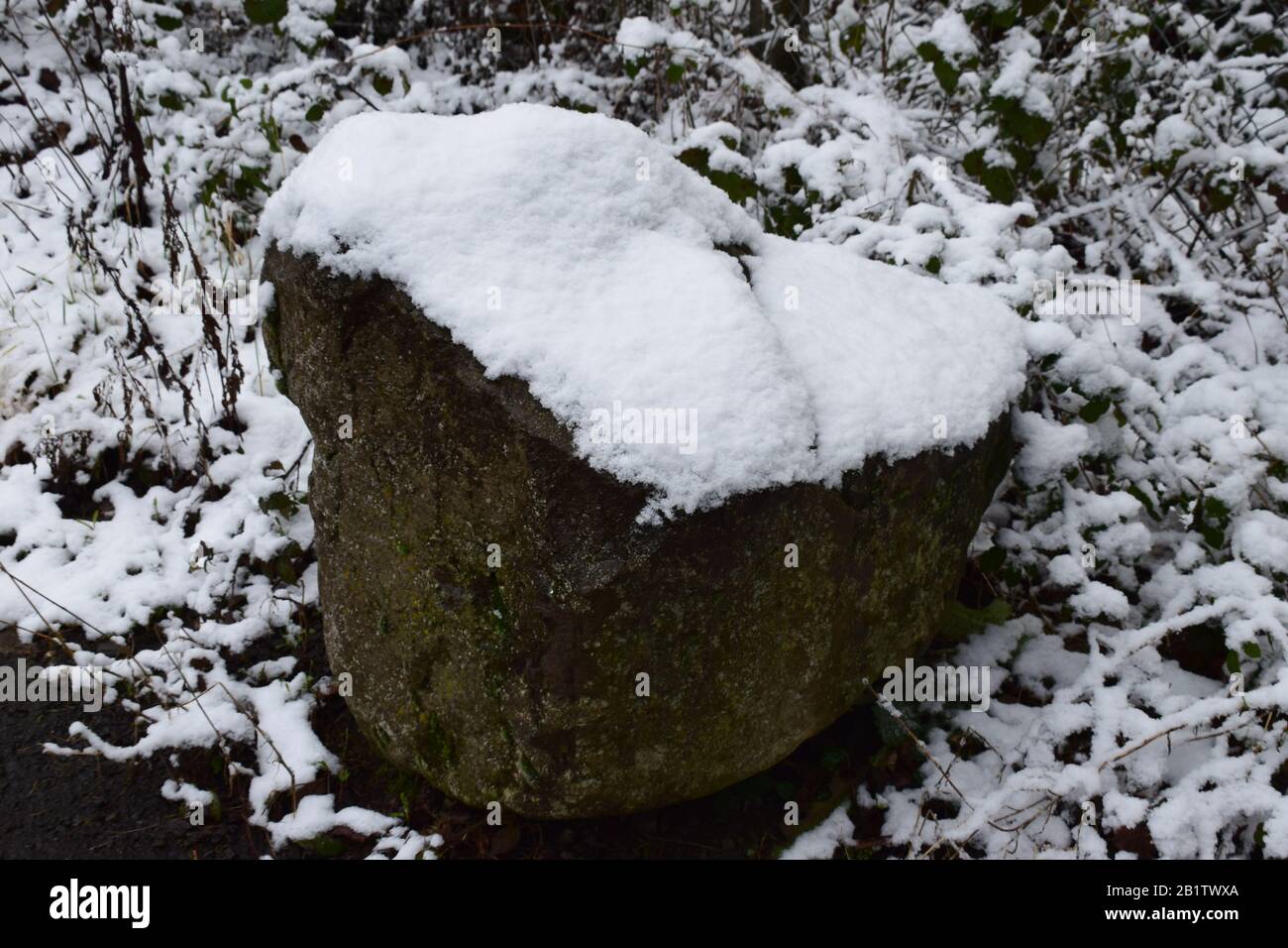 stone with snow Stock Photo - Alamy
