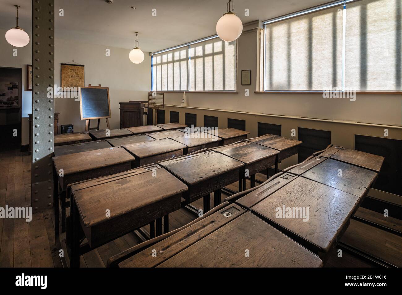 Victorian Classroom and wooden desks with ink pots in The Radstock ...