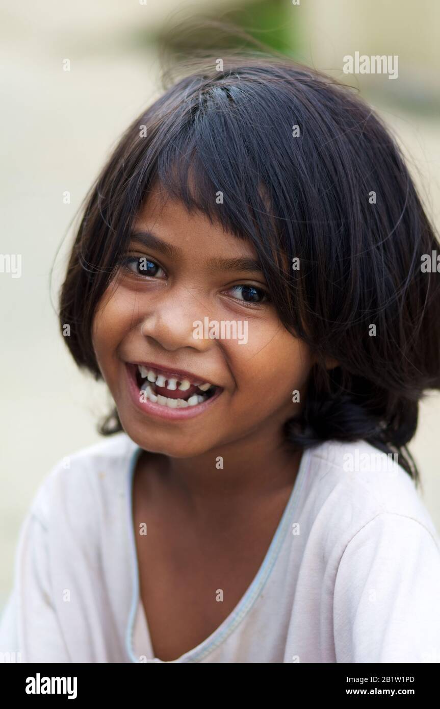 Indonesian child in Sorong harbor - Occidental Papua, Indonesia Stock ...