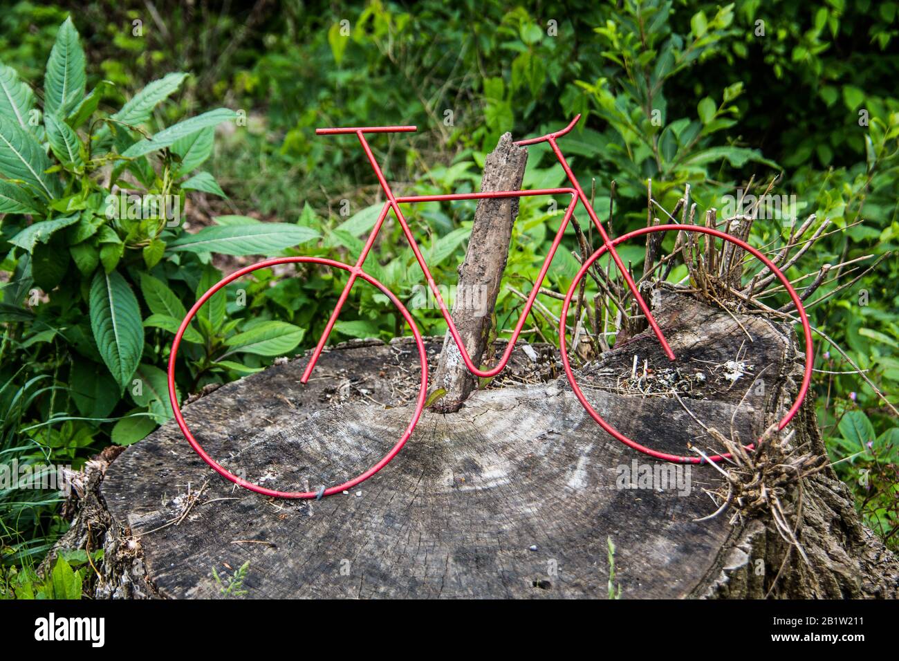 red bicycle symbol on the roadside Stock Photo - Alamy