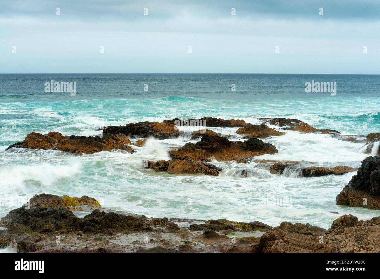 Geological features along Seal Rock Beach form barriers against the ...