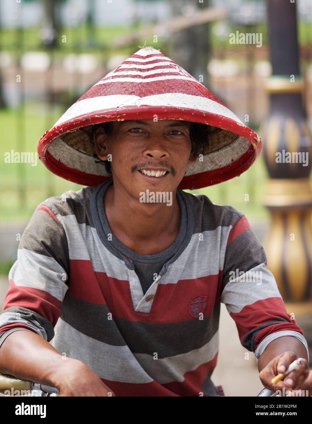 Taxi bycicle driver in Batavia neighborood in Jakarta - Java, Indonesia ...
