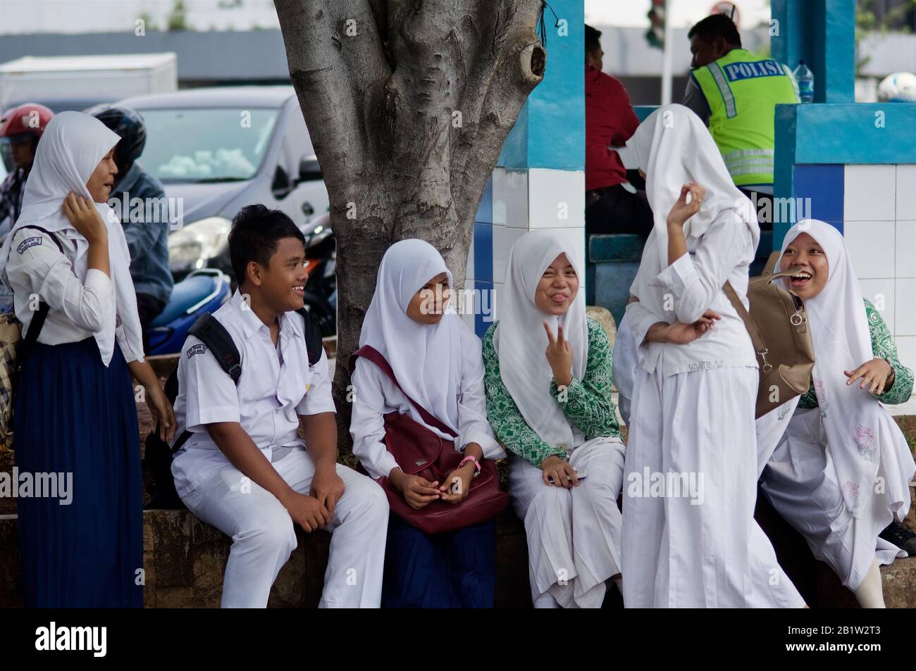 Veiled Indonesian muslim student girls with uniform in Batavia ...