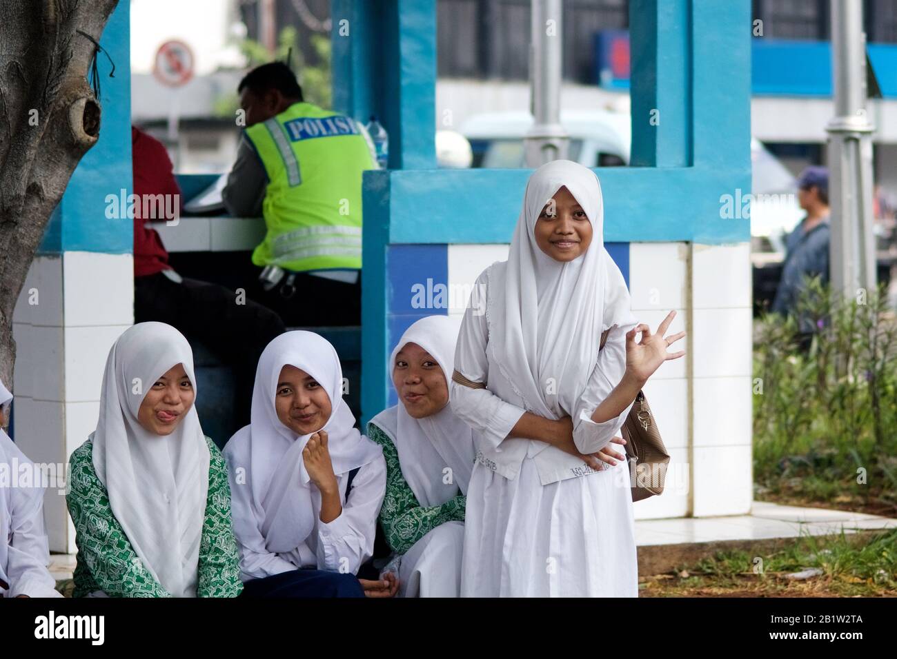 Veiled Indonesian muslim student girls with uniform in Batavia ...