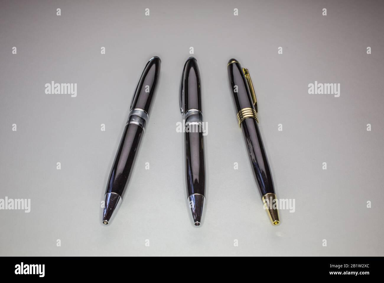 Golden pens hi-res stock photography and images - Alamy