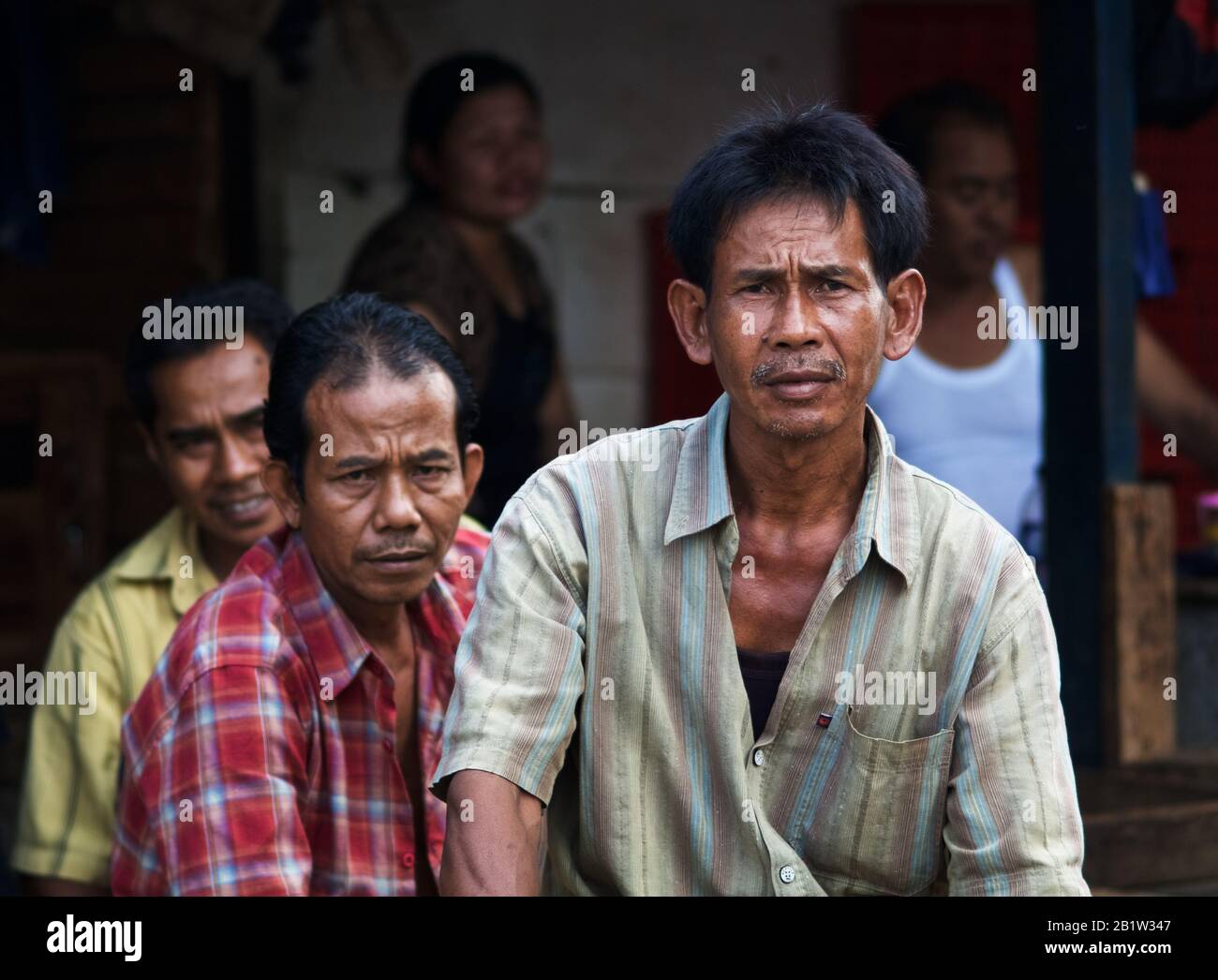 Indonesian men at market in Glodok, the Chinese neighborhood in Jakarta ...