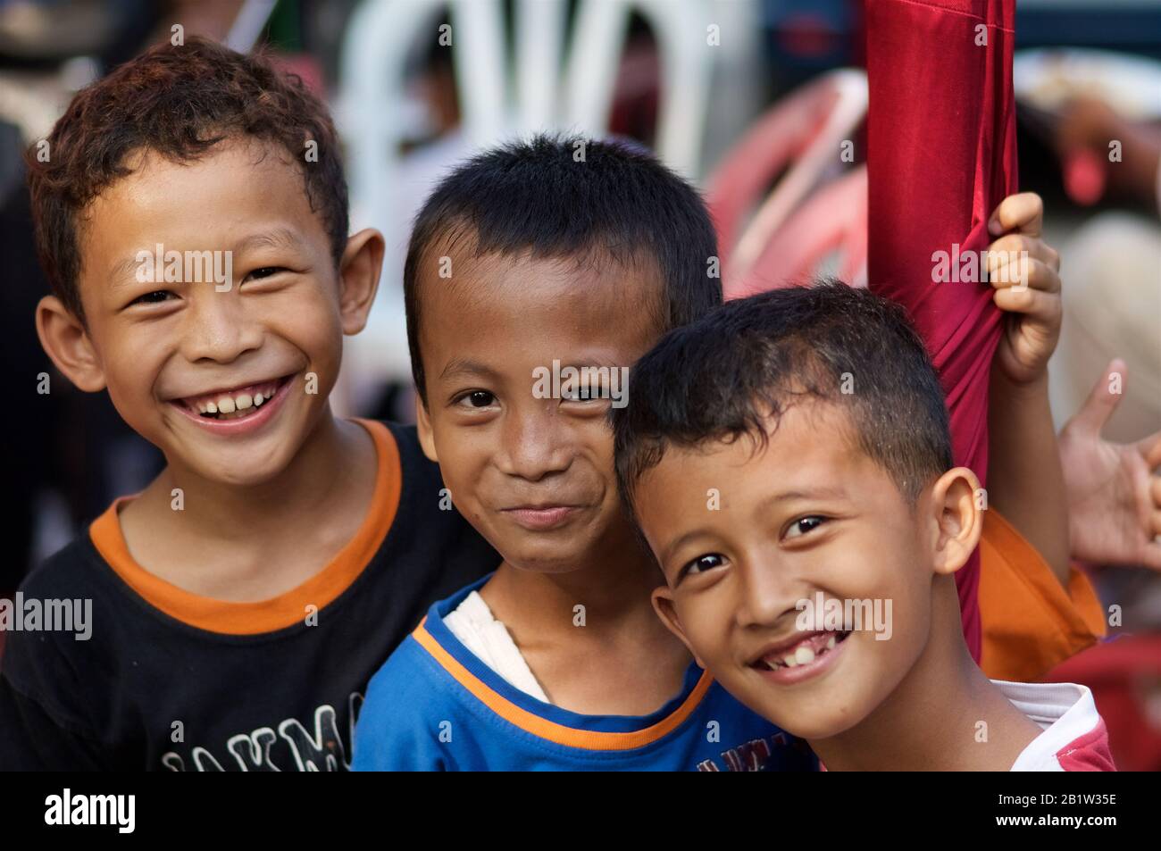 Indonesian children smiling in Glodok, the Chinese neighborhood in ...