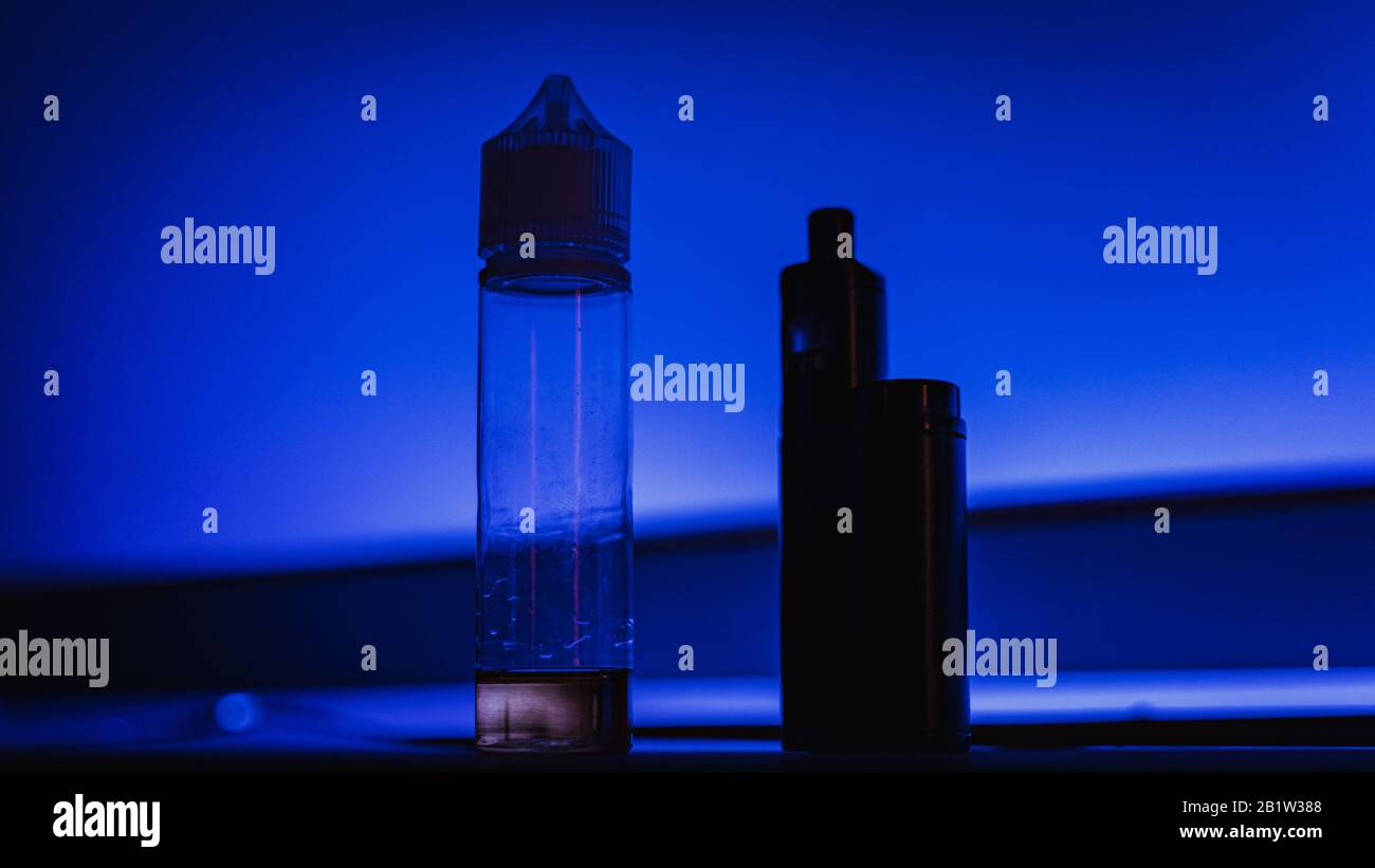 vape cigarette with liquid bottle Stock Photo - Alamy