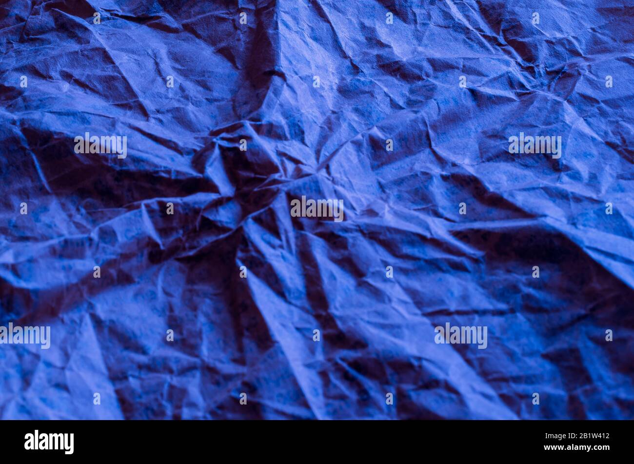 The texture of the used blue paper. Focus in the background. Abstract ...
