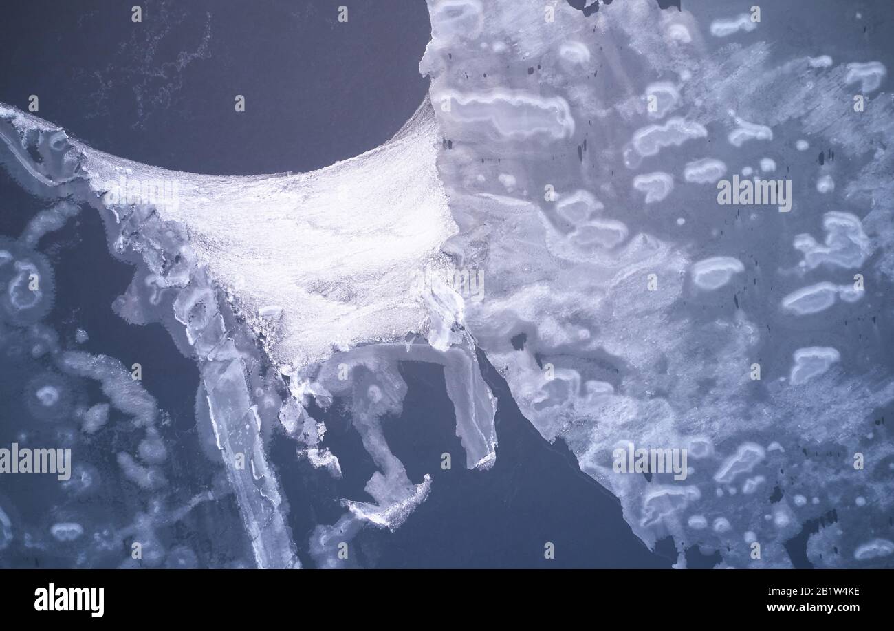 Abstract texture of frozen lake above dron top view Stock Photo - Alamy