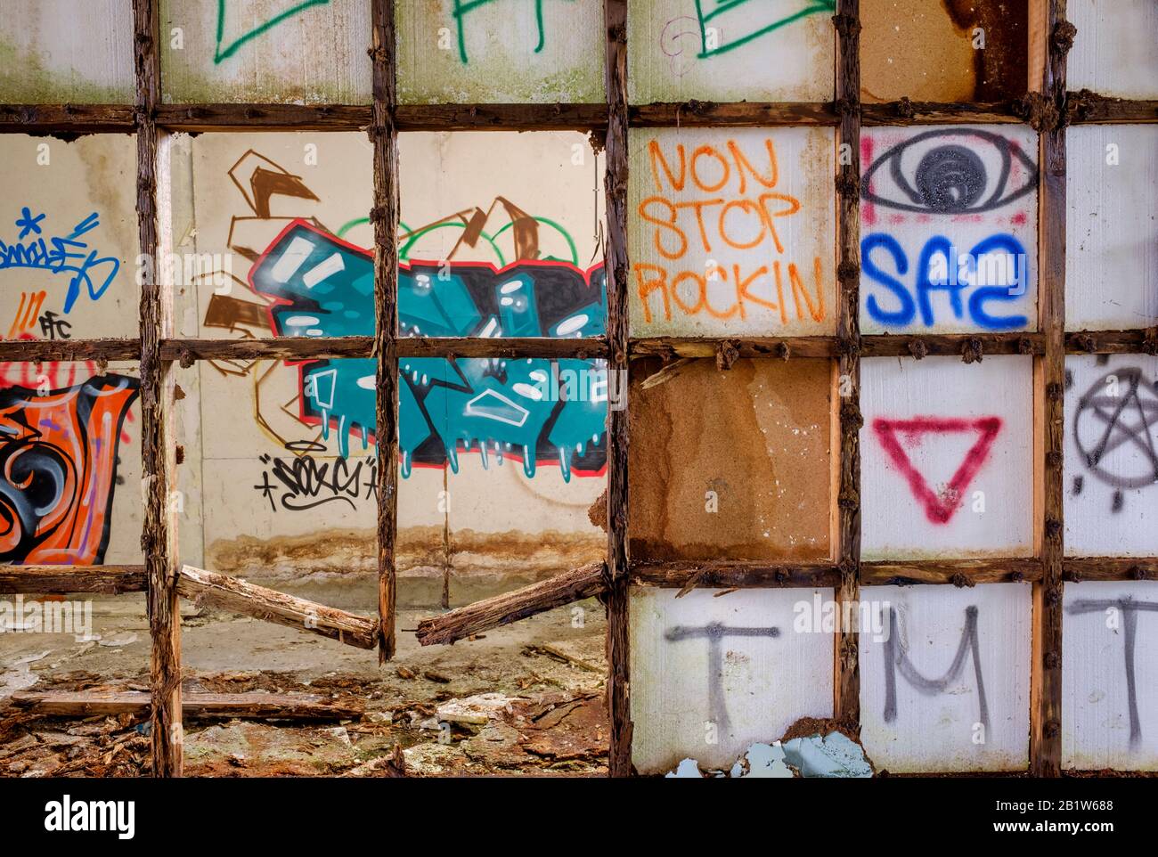 Urban neglected factory, isolated, deserted, forgotten with spray paint ...