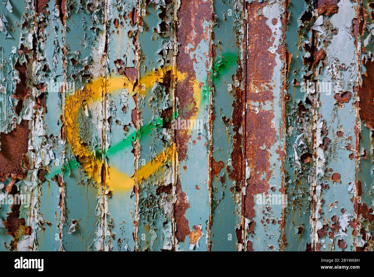 Urban neglected factory, isolated, deserted, forgotten with spray paint ...