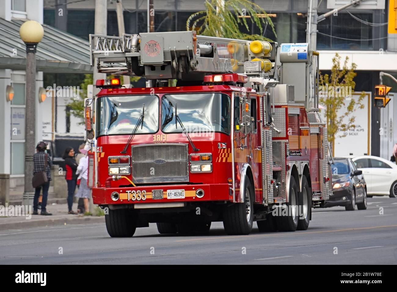 Fire department vehicle rushing in the streets of Toronto, Canada Stock ...