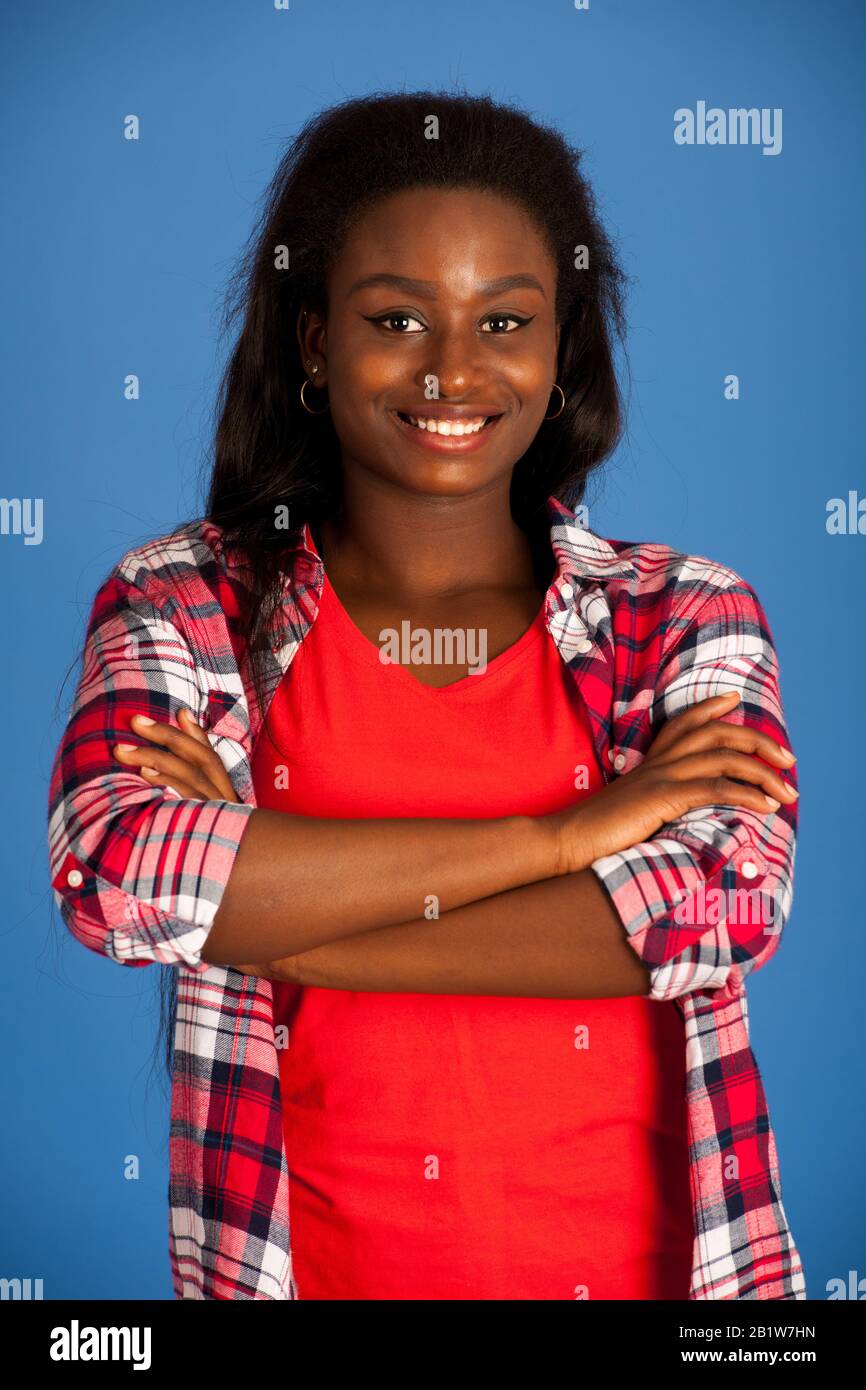Attractive young woman pose over white background Stock Photo - Alamy