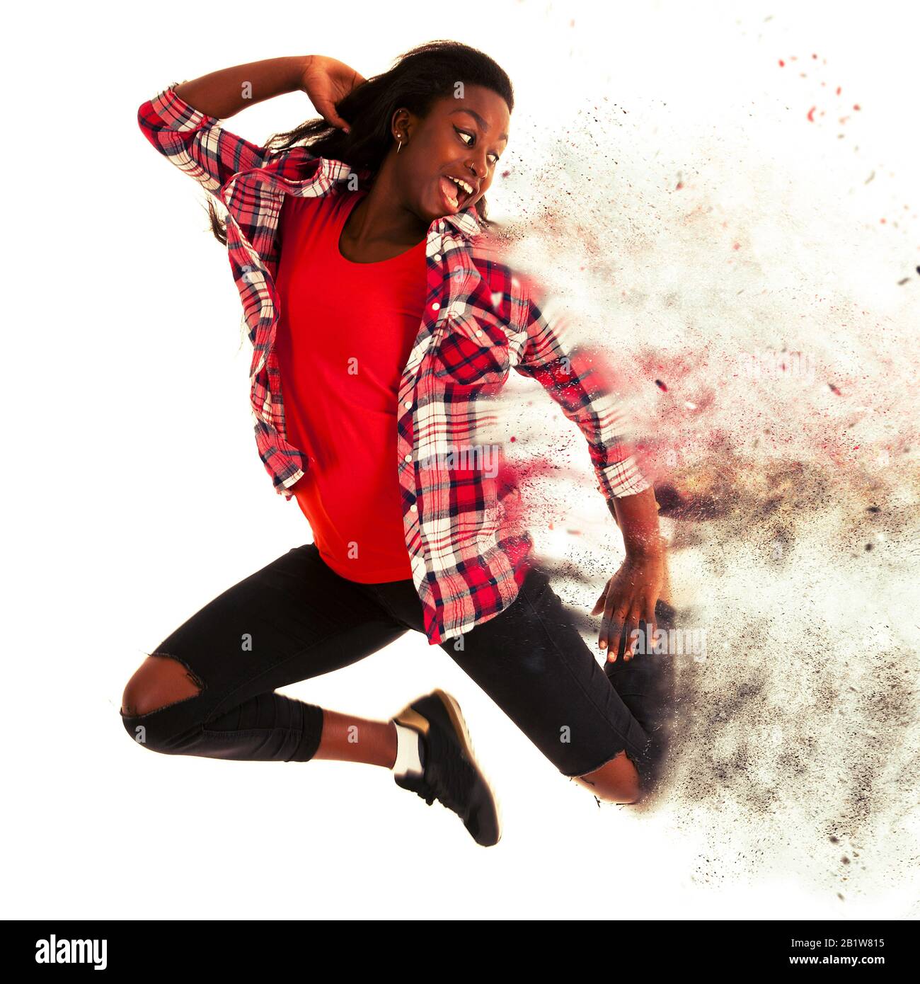 Active young woman dancer jumps in the air isolated over white ...