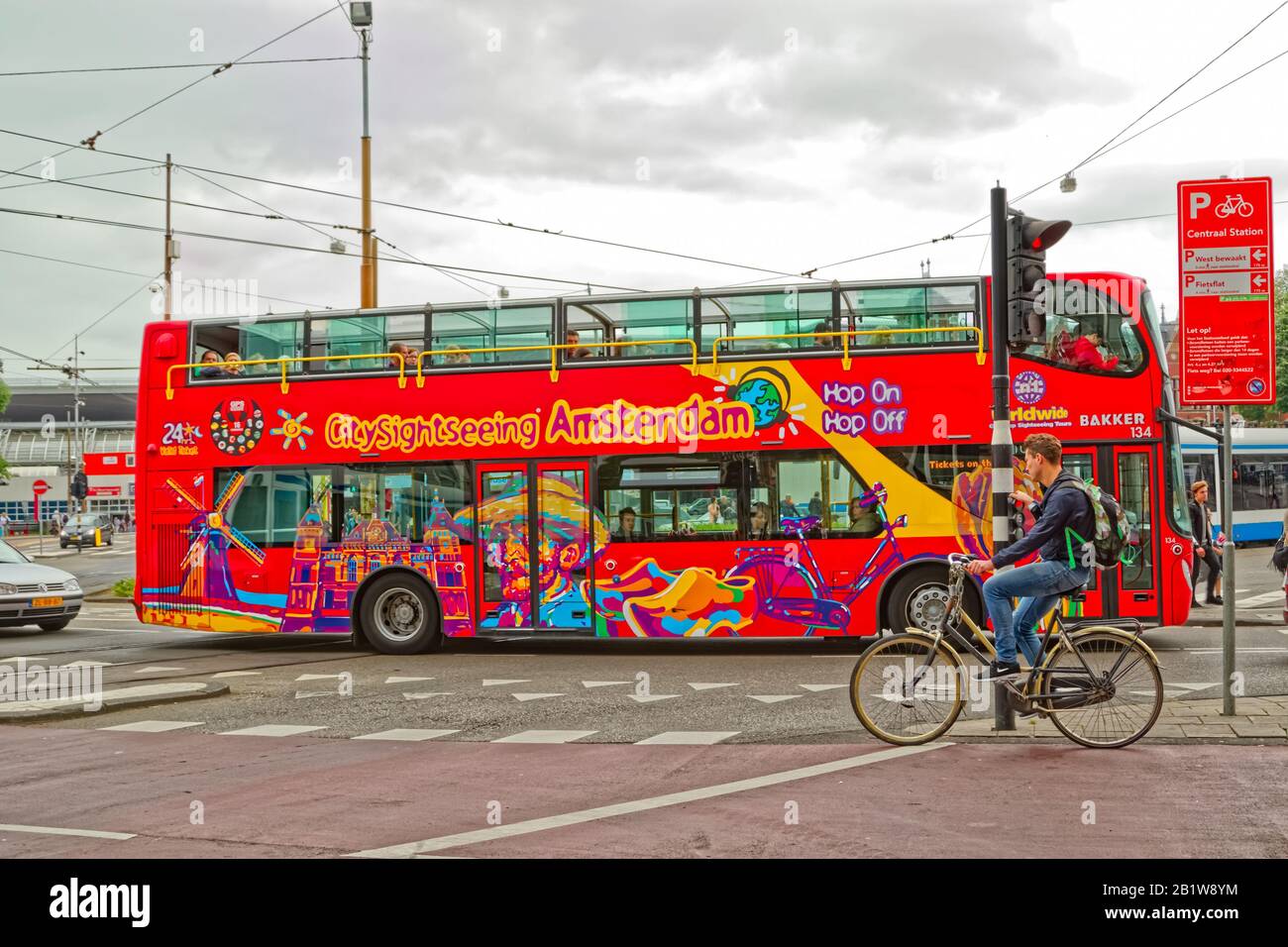 Amsterdam citysightseeing bus at the intersection in city center Stock ...