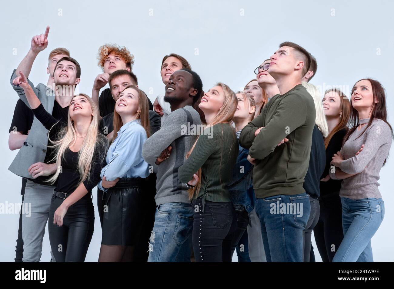 large group of friends looking up hopefully . isolated on white Stock ...