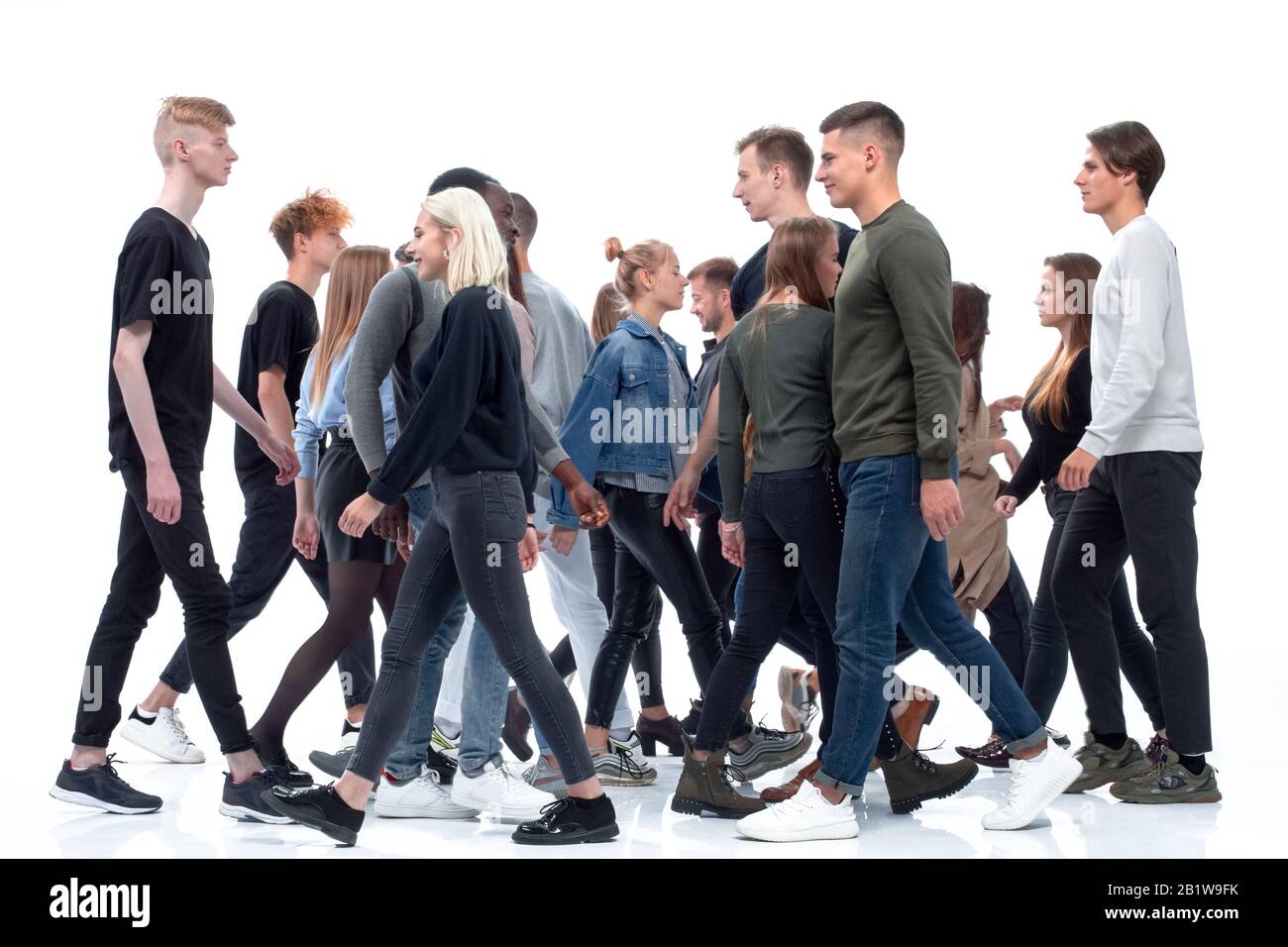 casual young people walking in different directions Stock Photo - Alamy