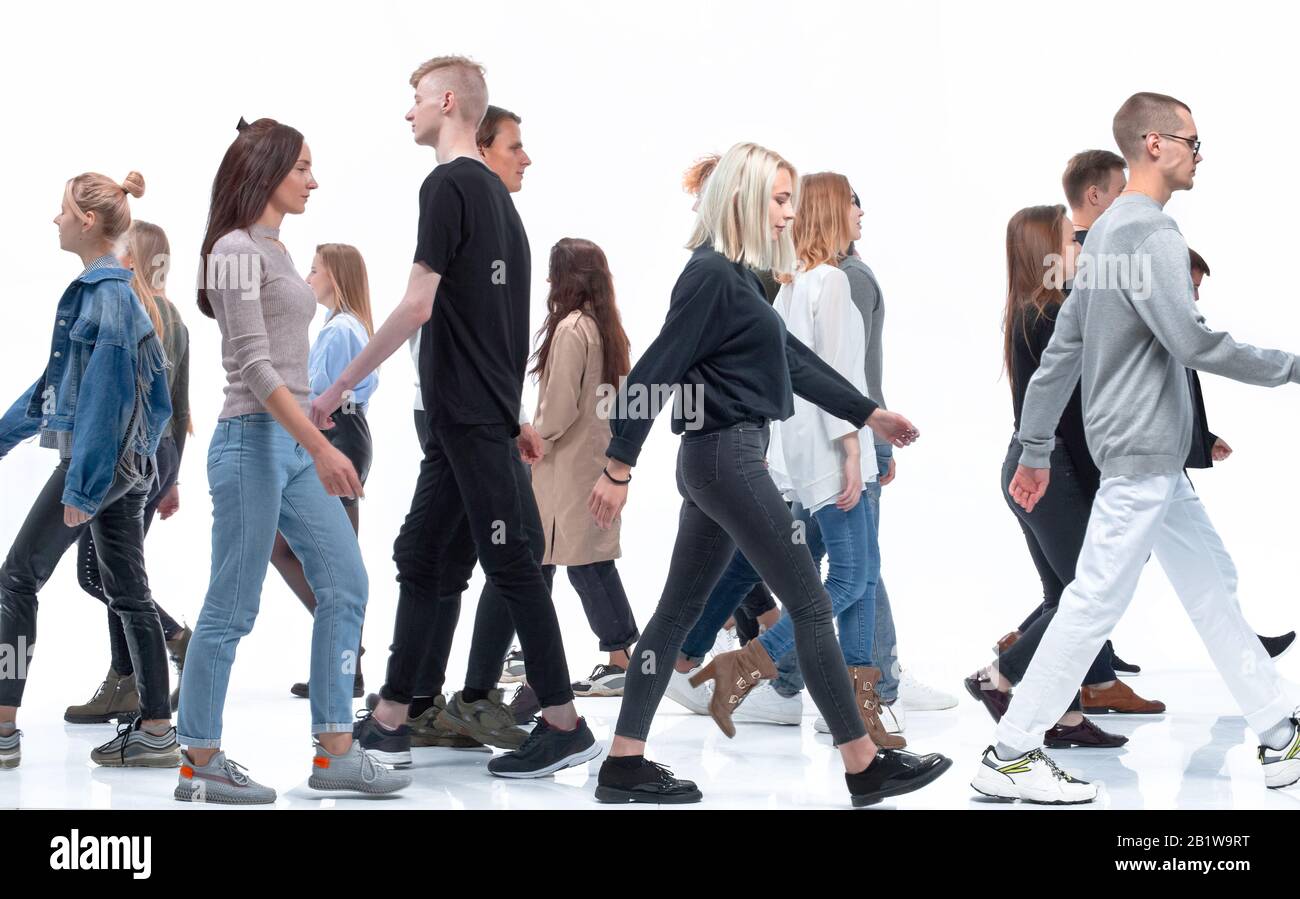 casual young people walking in different directions Stock Photo - Alamy