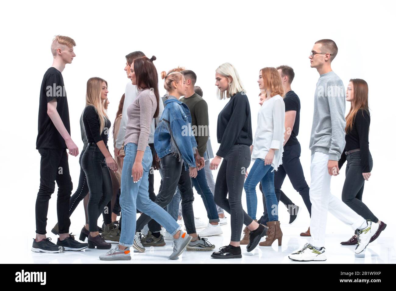 casual young people walking in different directions Stock Photo - Alamy