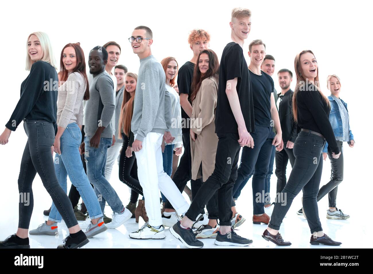 smiling casual people walk past each othe Stock Photo - Alamy