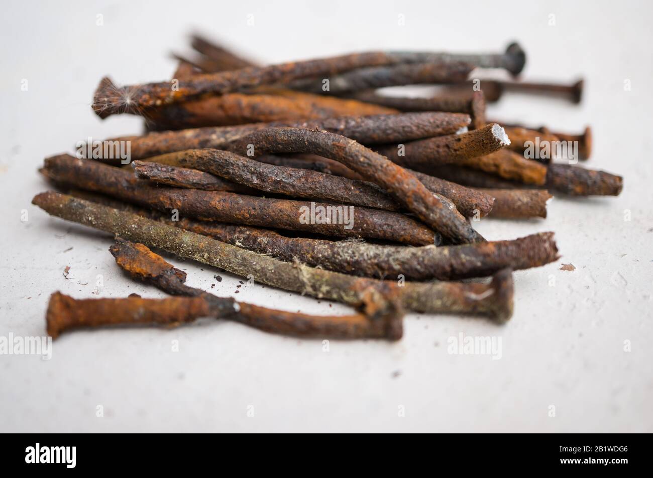 Old rusty bent nails hi-res stock photography and images - Alamy