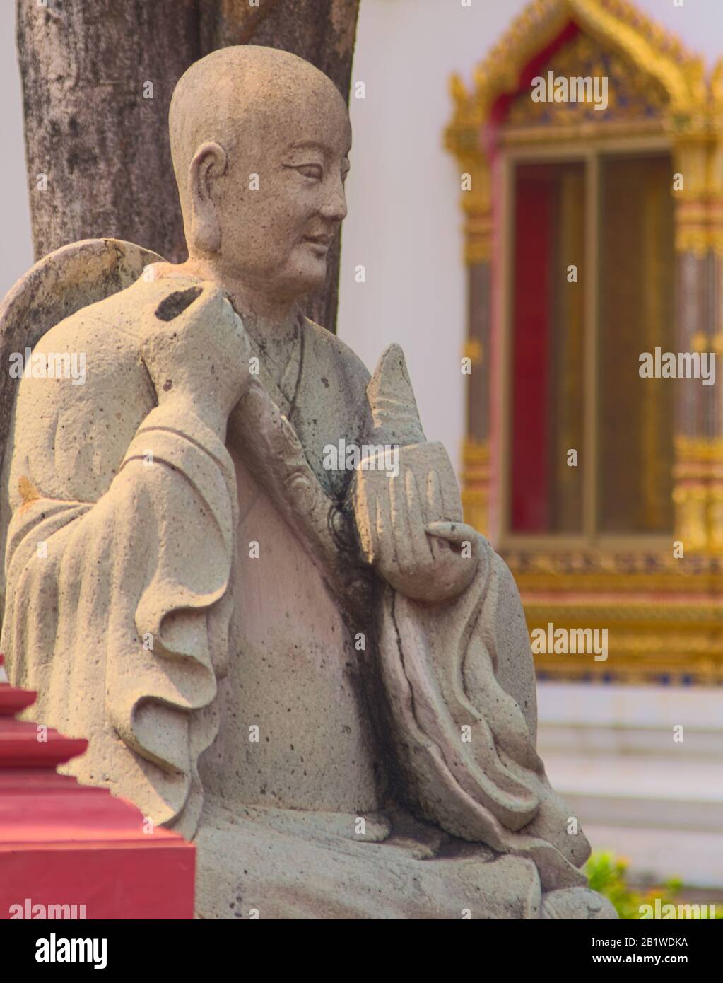 Stone statue of a buddhist monk at Wat Benchamabophit temple, in ...