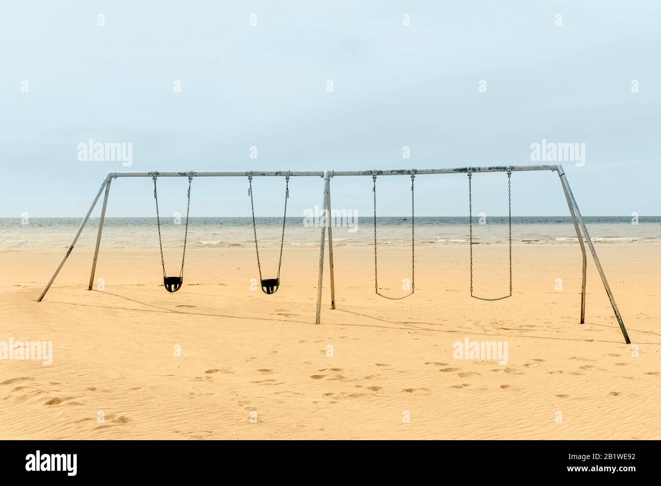 Beach swing set at Douglas Park, First Street Beach on Lake Michigan in ...