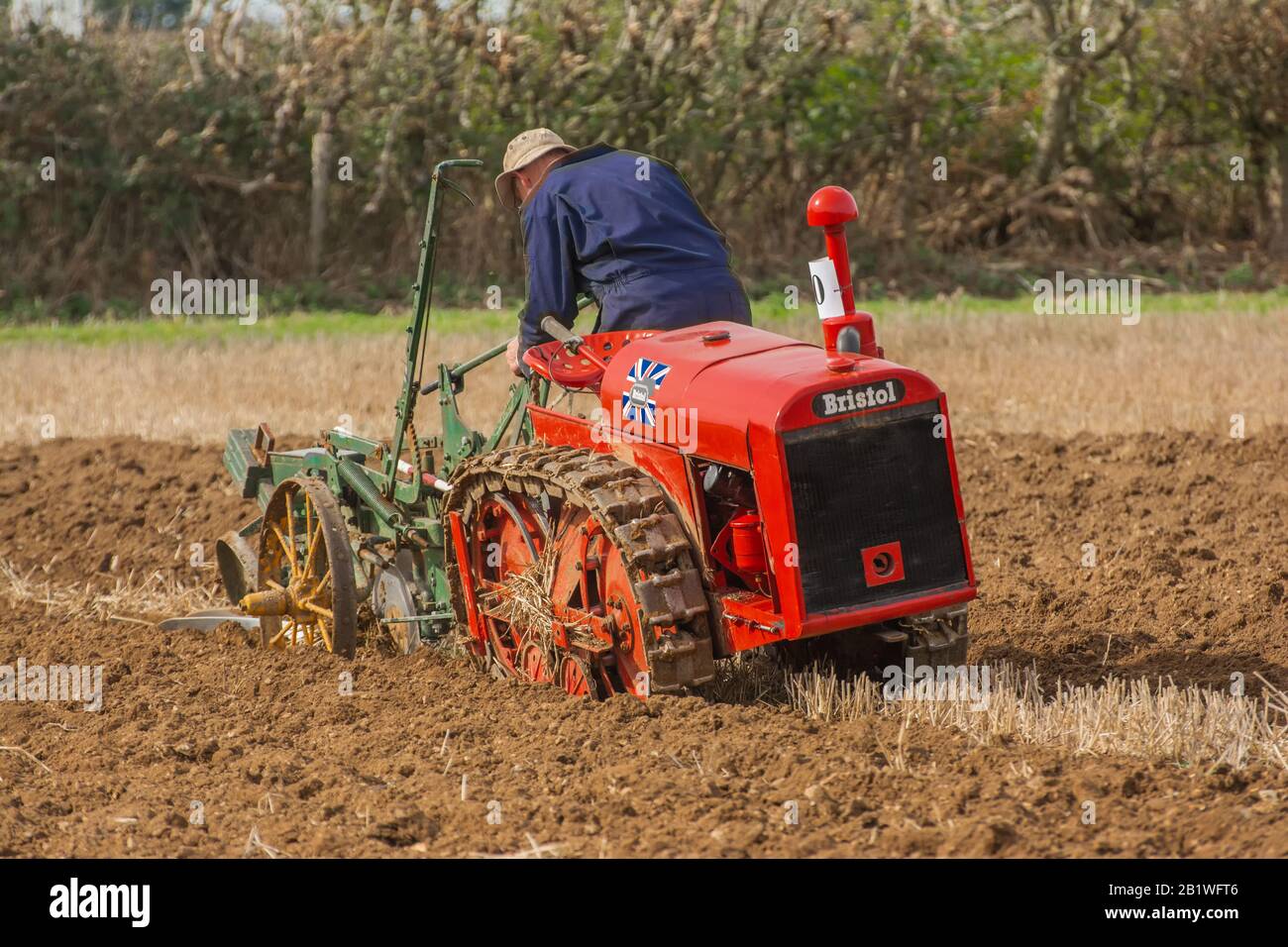 Vintage class Bristol crawler tractor Ploughing furrow field plough ...