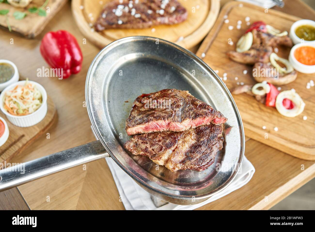 Grilled striploin steak. The strip steak or New York strip On a metal ...