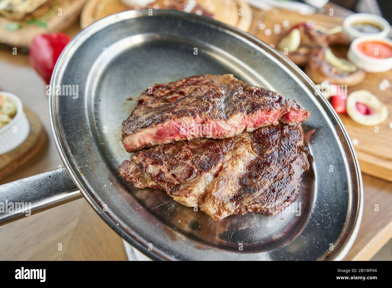 Grilled striploin steak. The strip steak or New York strip On a metal ...