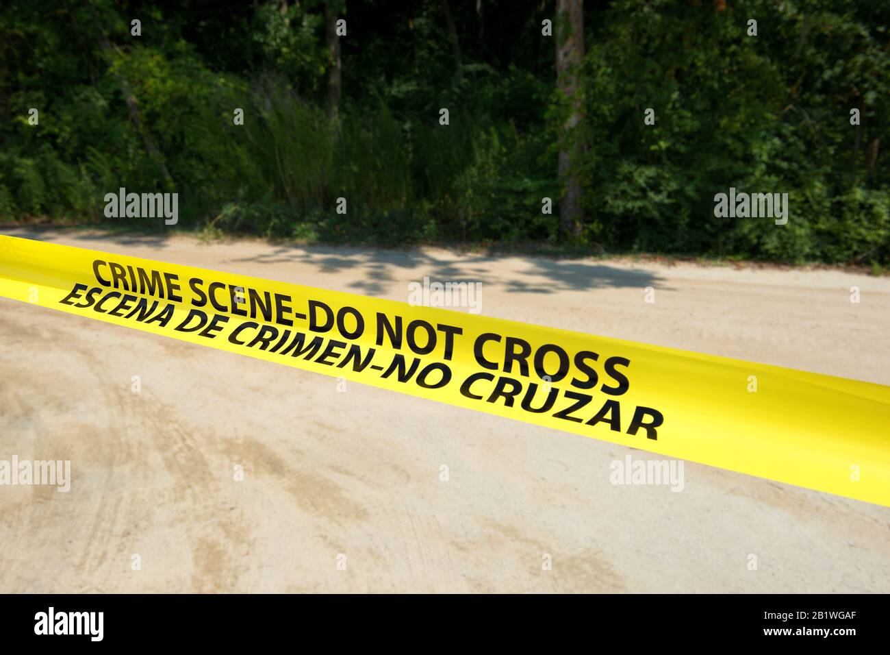 Police: yellow crime scene tape (crime scene do not cross / escena de ...