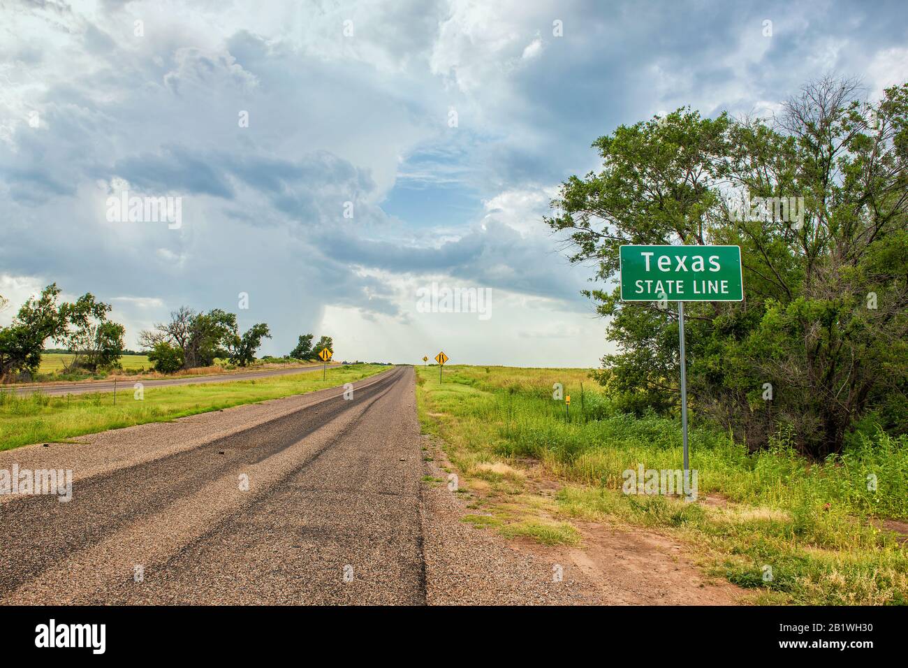 Texas Stateline sign next to historic Route 66 near the town of Texola ...