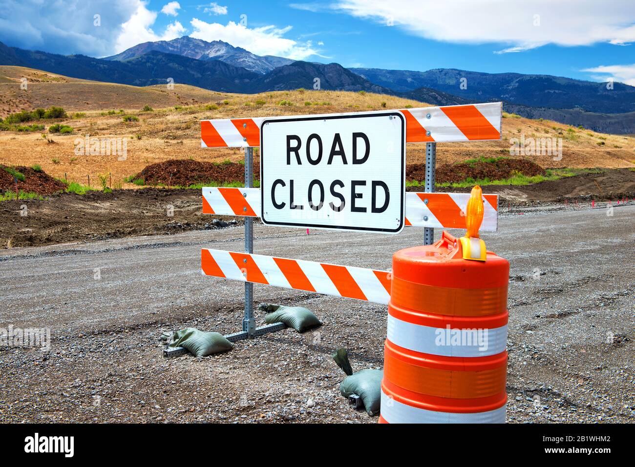 Road closed sign with cone on dirt road on road construction site Stock ...
