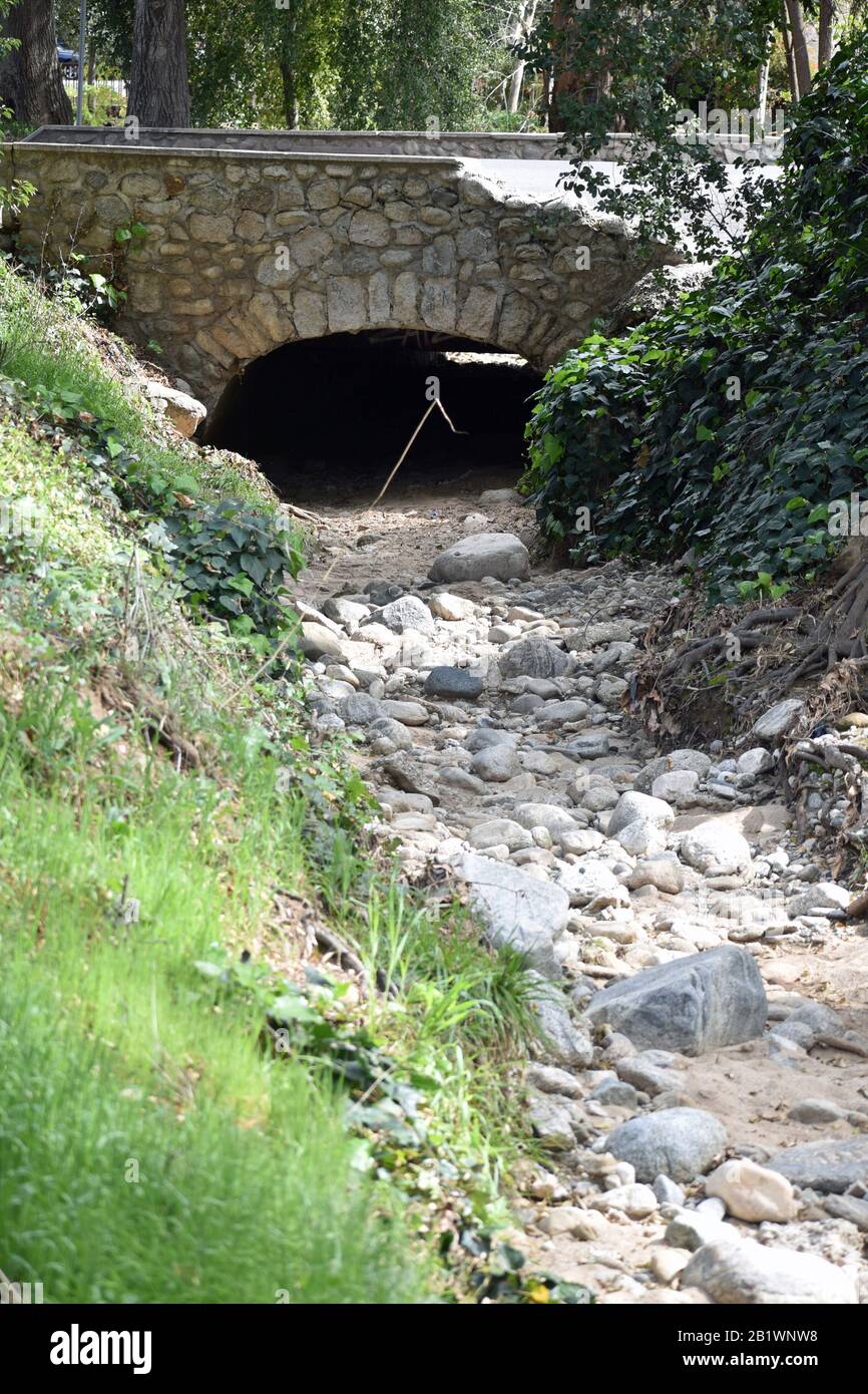 Rock Bridge over Stream Bed Stock Photo - Alamy