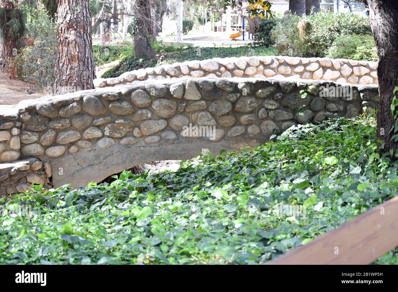 Rock Bridge over Stream Bed Stock Photo - Alamy