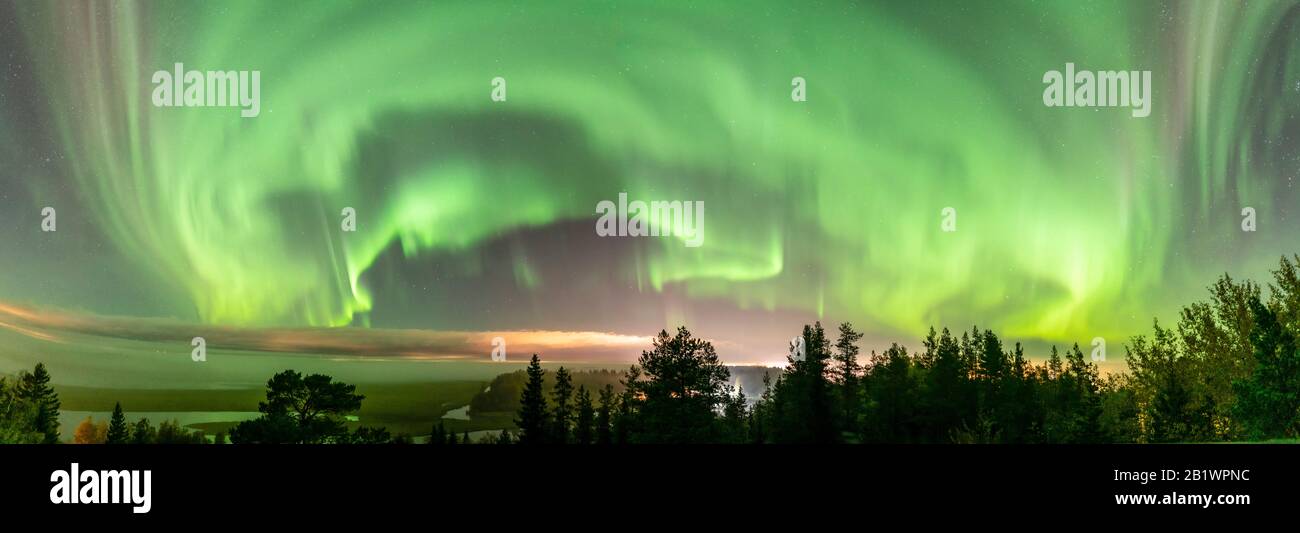Beautiful Northern Lights at partly clear skies with thick fog shines ...
