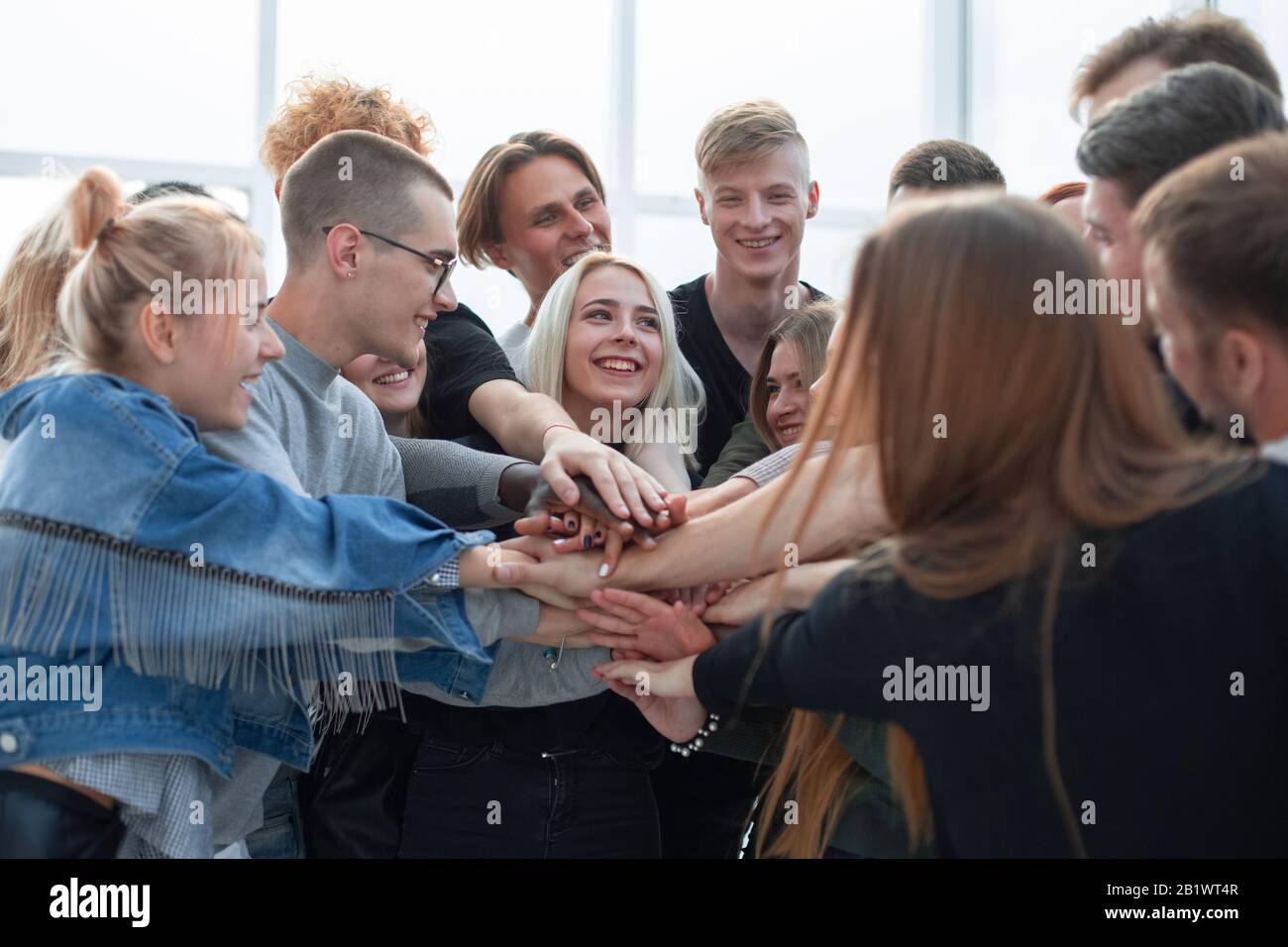 large group of young people showing their unity Stock Photo - Alamy
